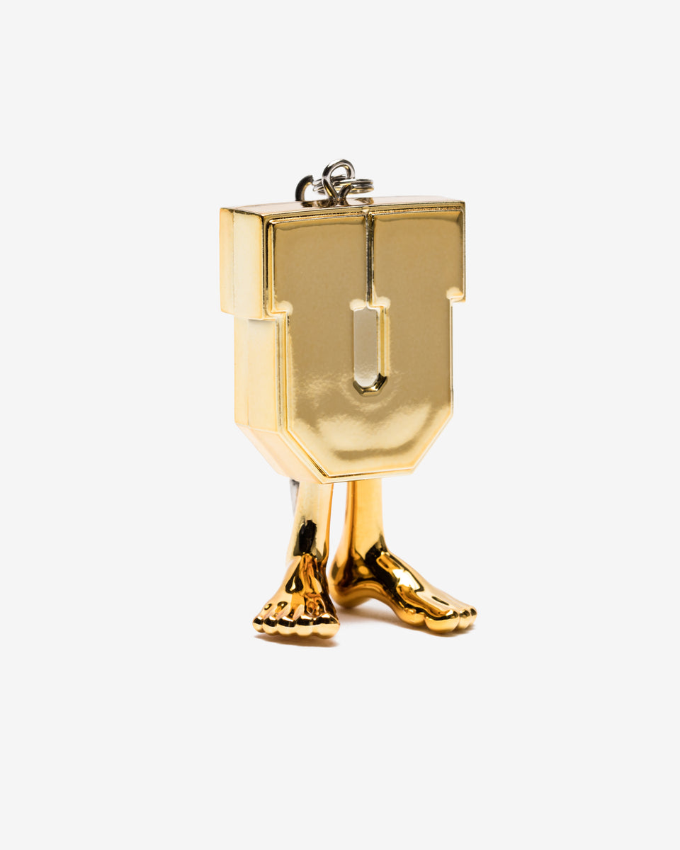 UNDEFEATED X MEDICOM UMAN KEYCHAIN - GOLD – Undefeated
